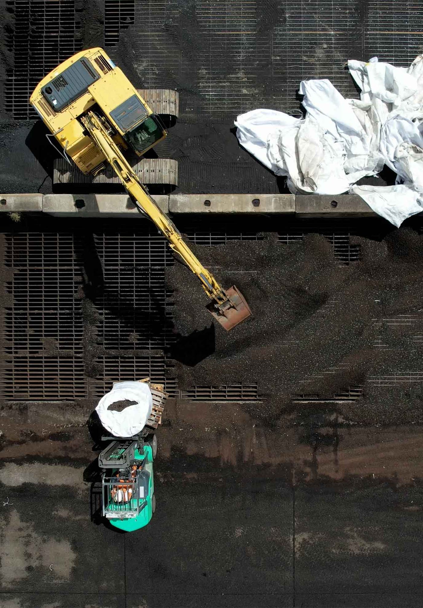 Drone shot of biomass pellets being transported