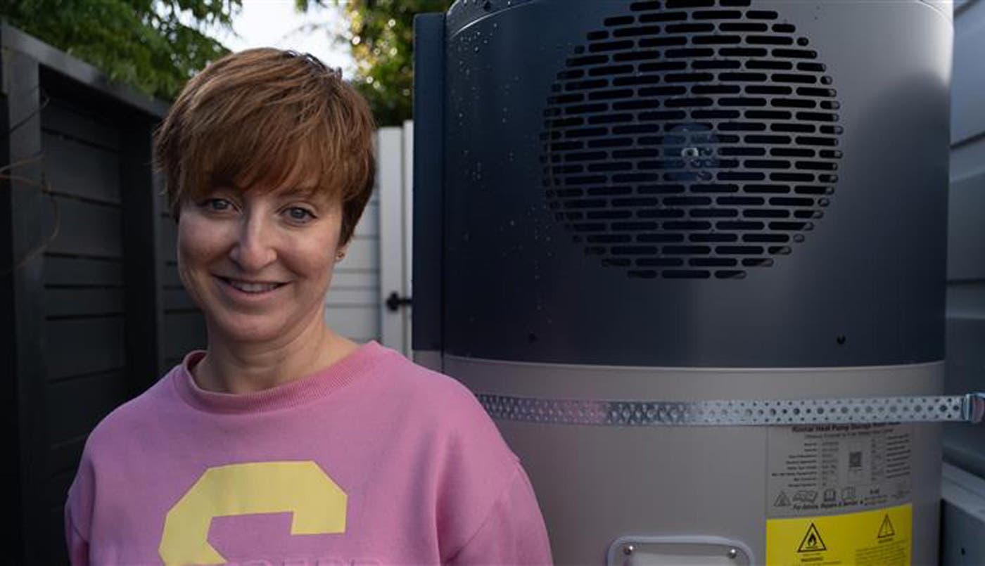 Isabelle Rousseau with hot water cylinder